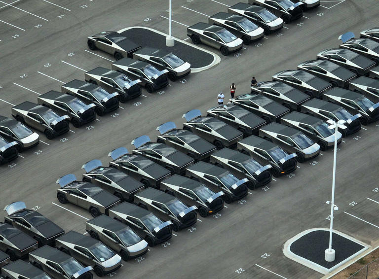 Flying panels to bad glue: Recalls for Tesla's 'indestructible ...