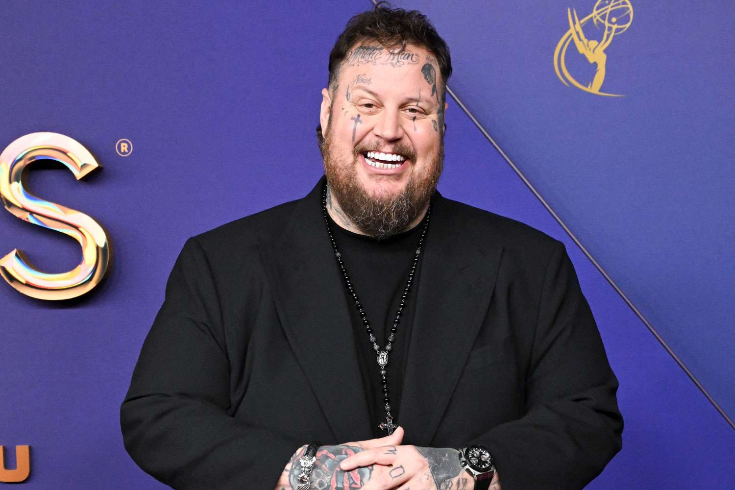 Jelly Roll reacts to the idea that his face tattoos are a call for ...