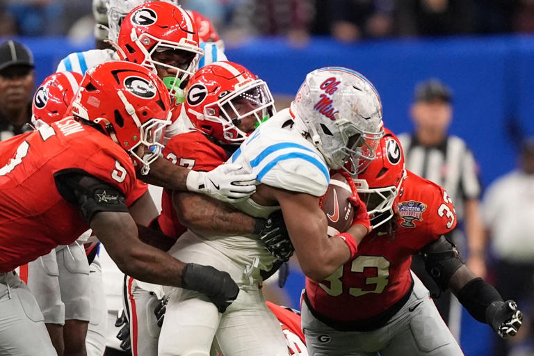 After 30 combined fourth-quarter points, Ole Miss upsets Georgia in ...