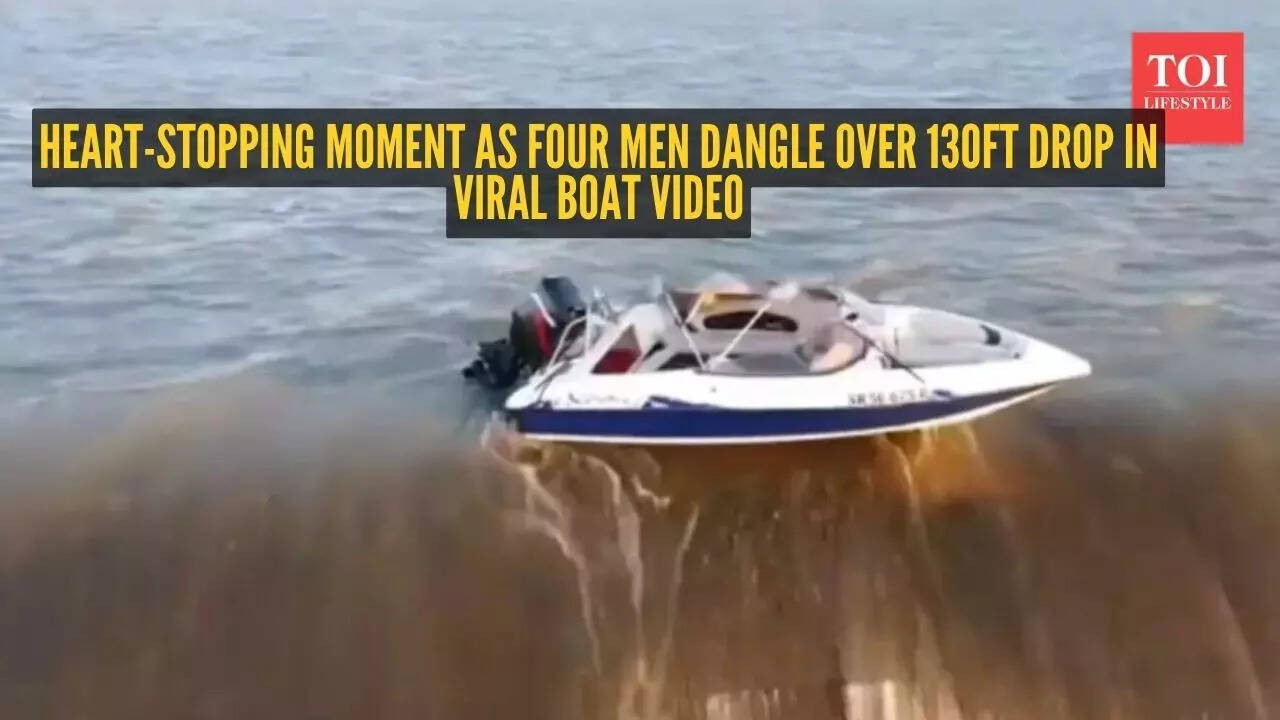 Heart-stopping moment as four men dangle over 130ft drop in viral boat ...