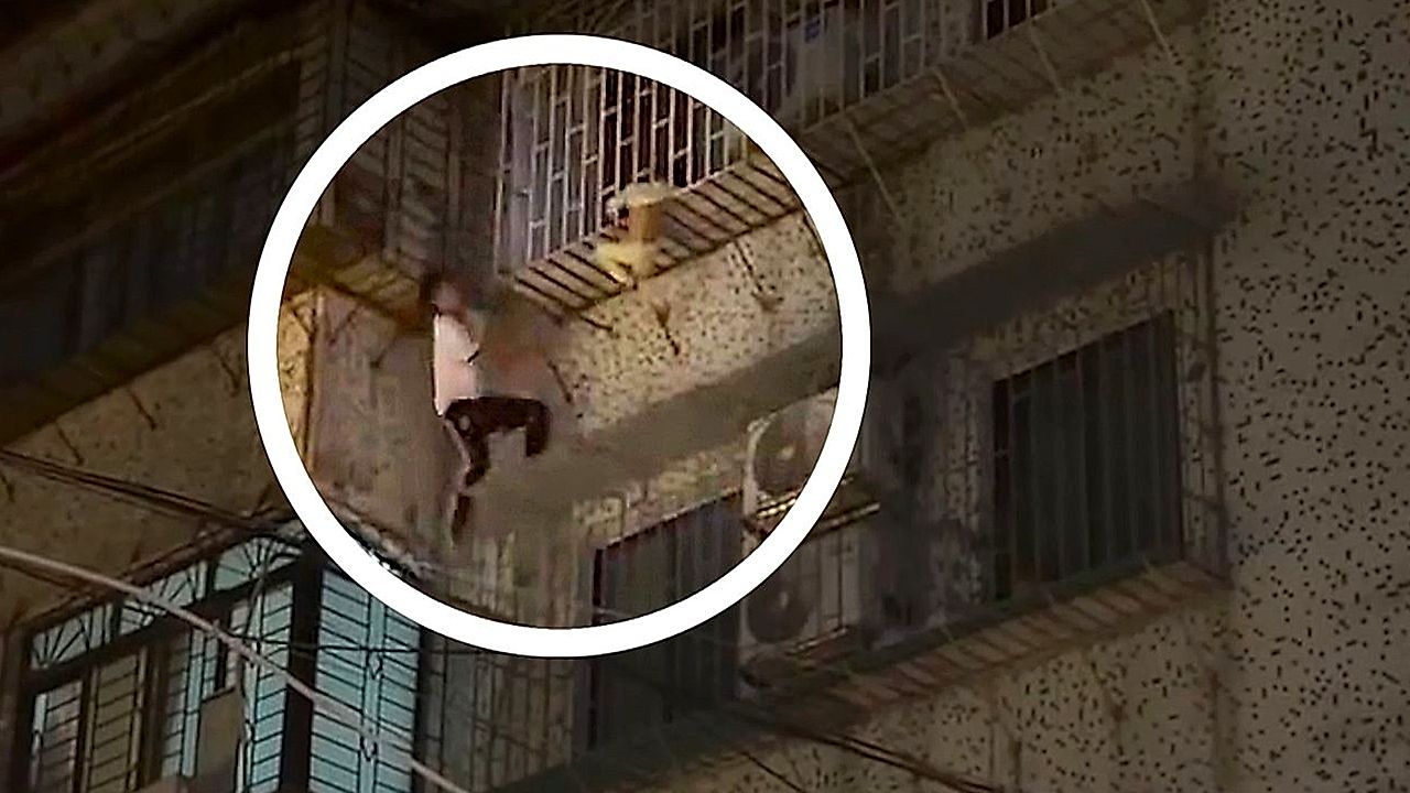 Real-life 'Spider-Man' climbs building to rescue hanging child in China