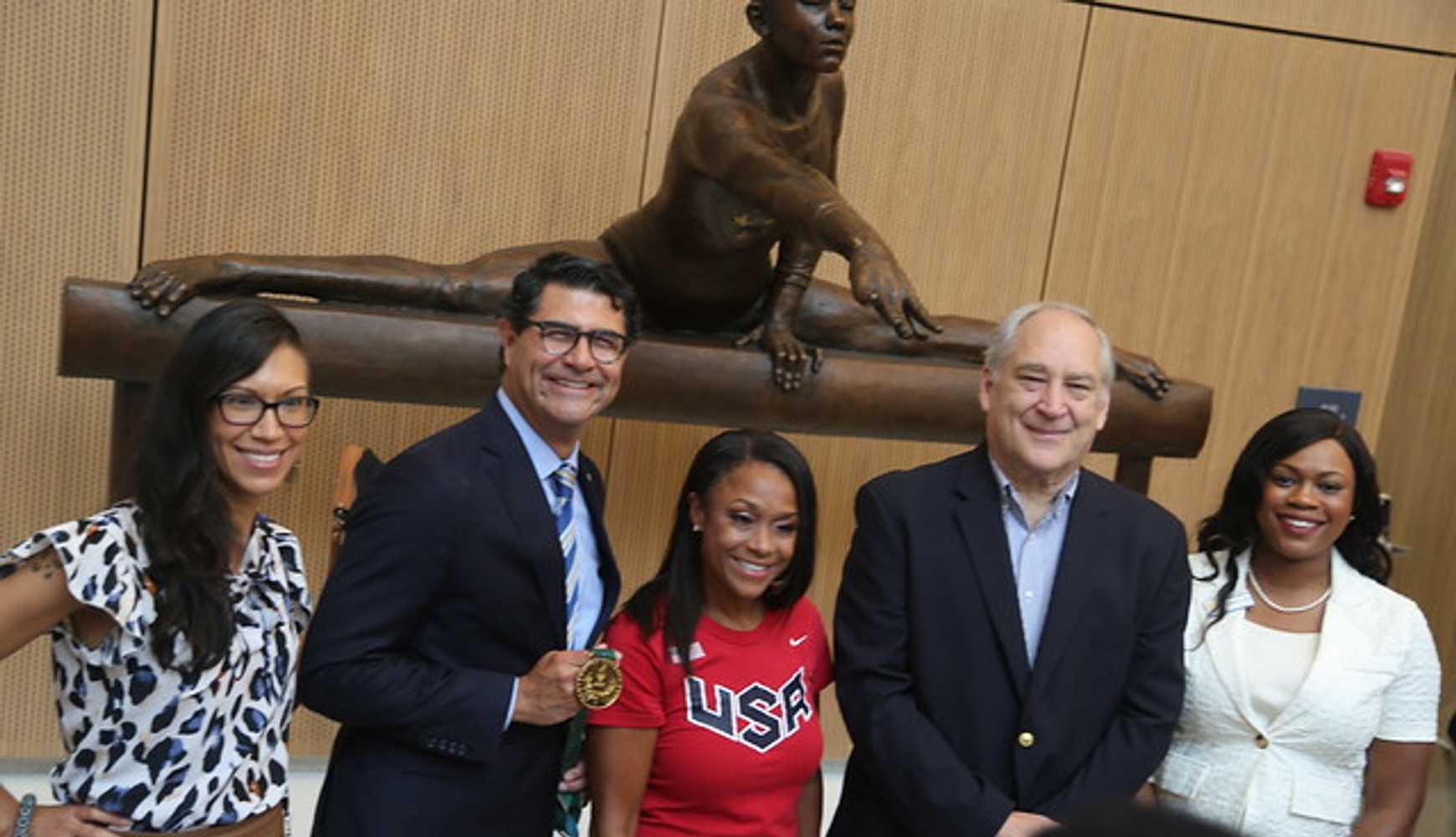Olympic icon Dominique Dawes to bring gymnastics empire back home to ...