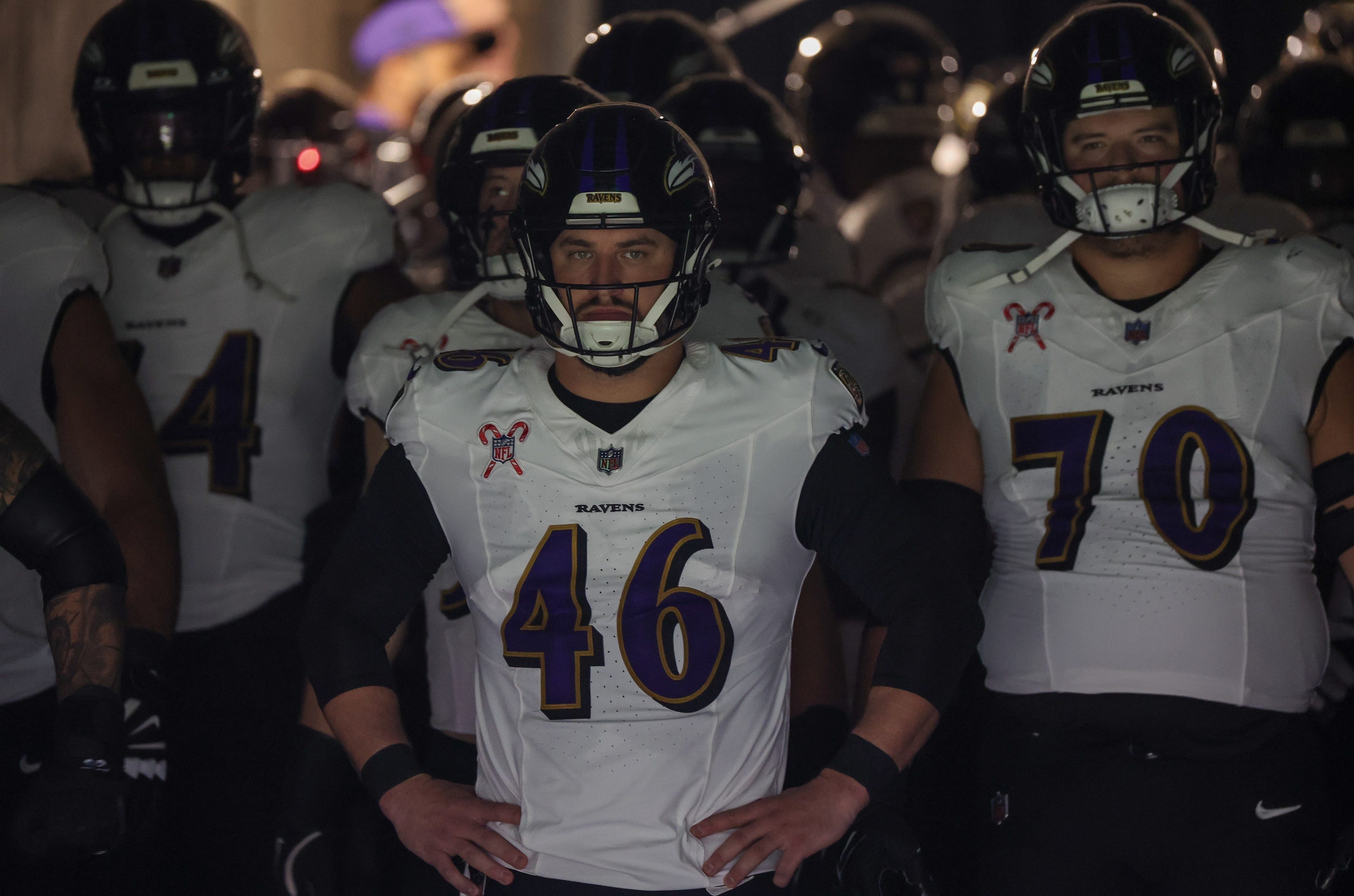 Ravens agree to a four-year contract extension with long snapper Nick Moore