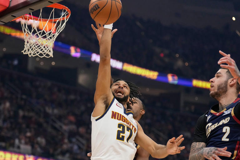 Donovan Mitchell scores 33 points, Cavaliers outlast short-handed ...