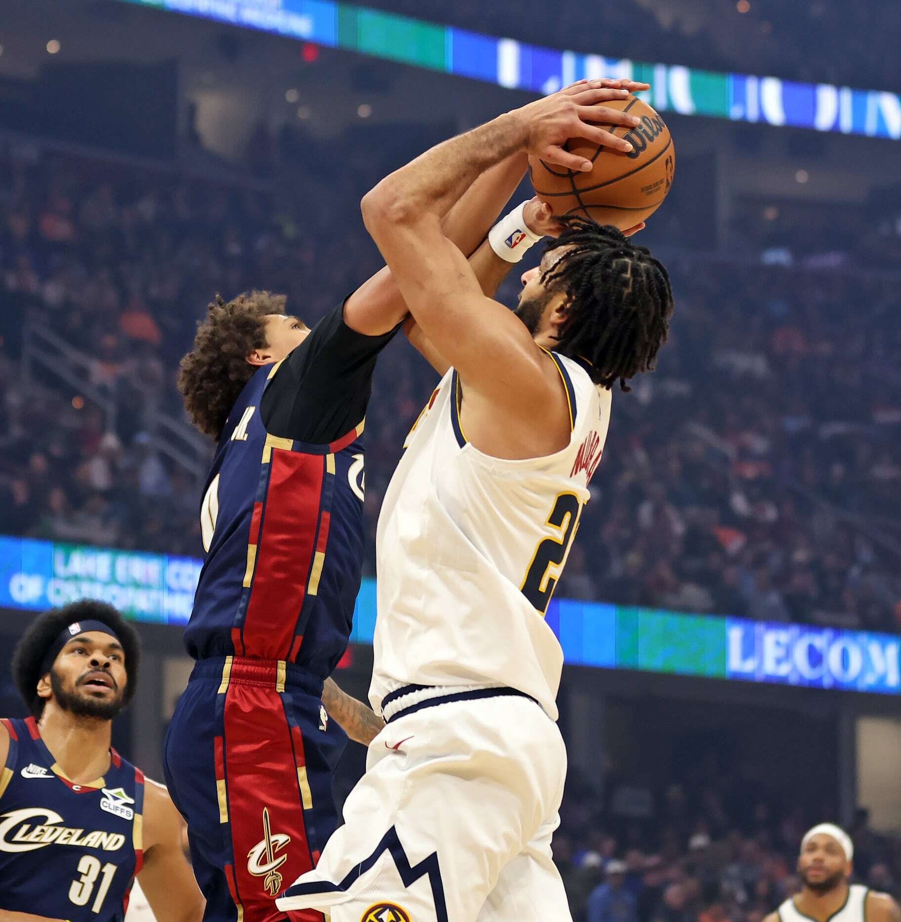 Cavs barely avoid another baffling loss, edge undermanned Nuggets, 113-108