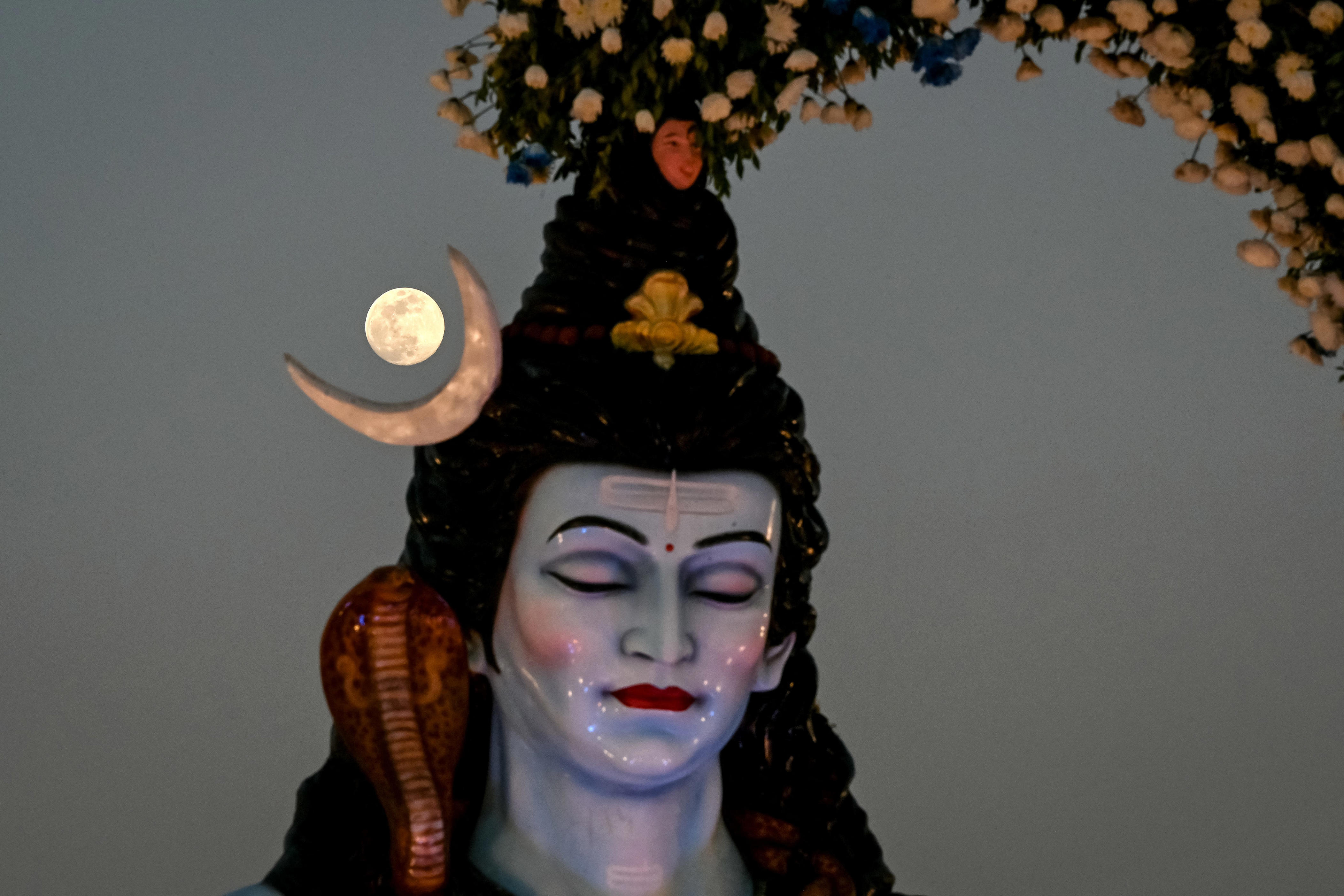 Wolf moon, the first supermoon of 2026, lights up the sky. See photos.