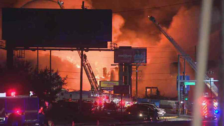 Firefighter injured in Denver five-alarm fire, building engulfed in flames