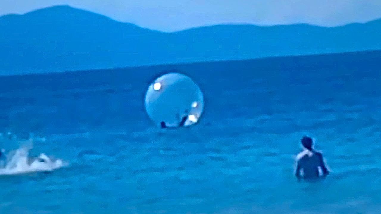 Terrifying moment: 8 years old girl swept out to sea in giant bubble