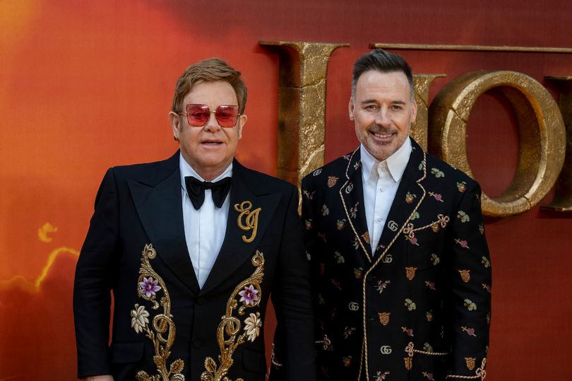 Elton John breaks strict family rule as sons' faces seen for first time ...