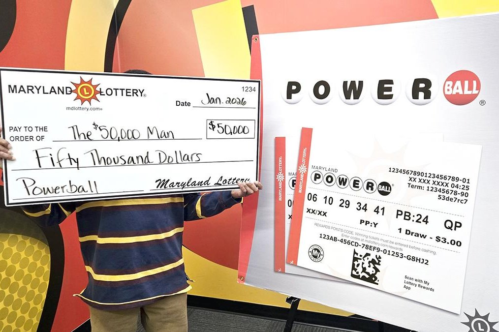 Look: Maryland man collects his second big lottery prize eight years later