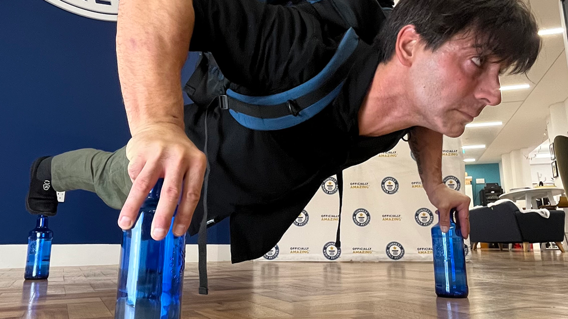 Most push ups on glass bottles carrying a 60lb pack - 225 by Alejandro ...