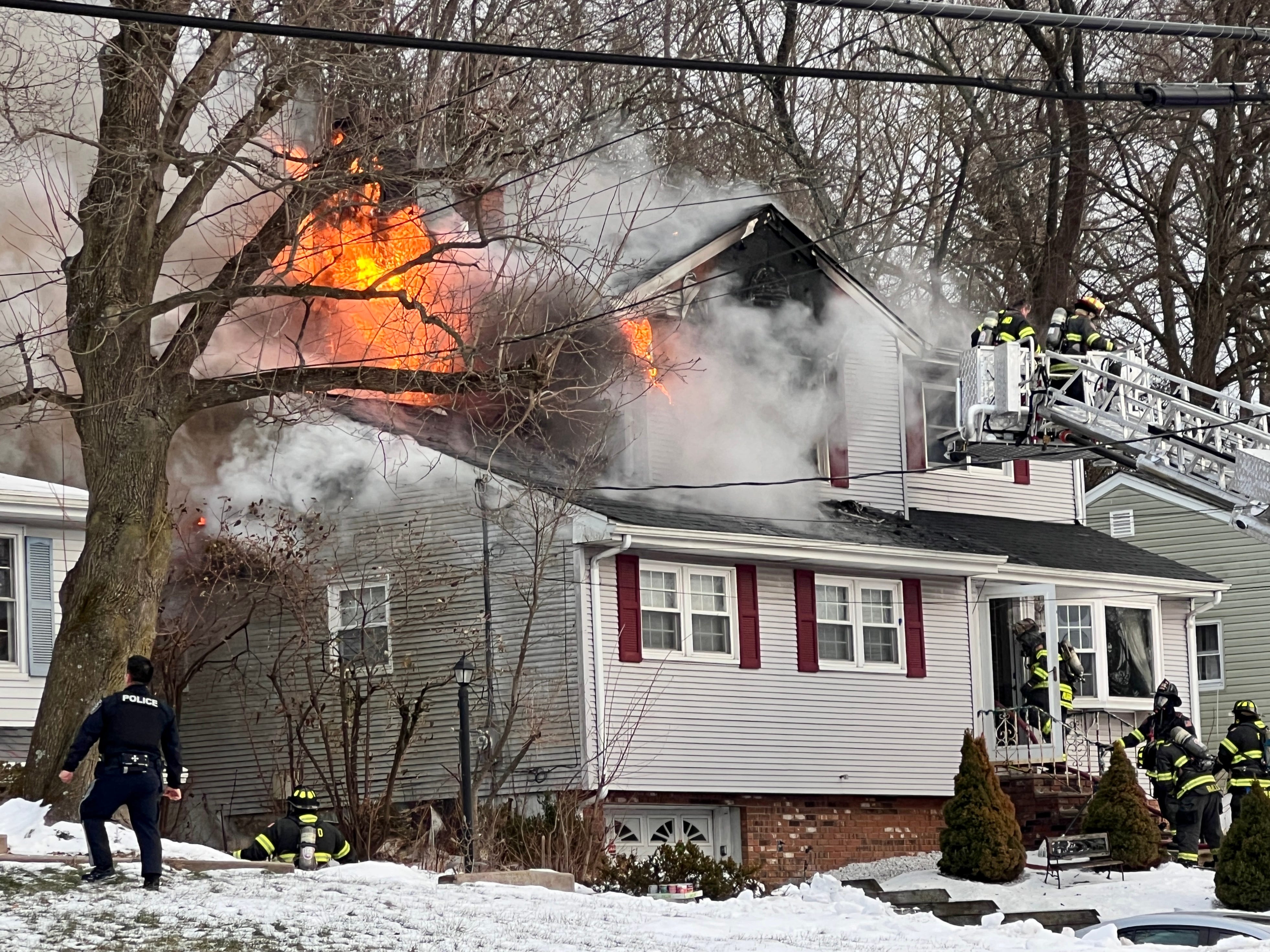 Firefighters battle house fire in Oakland