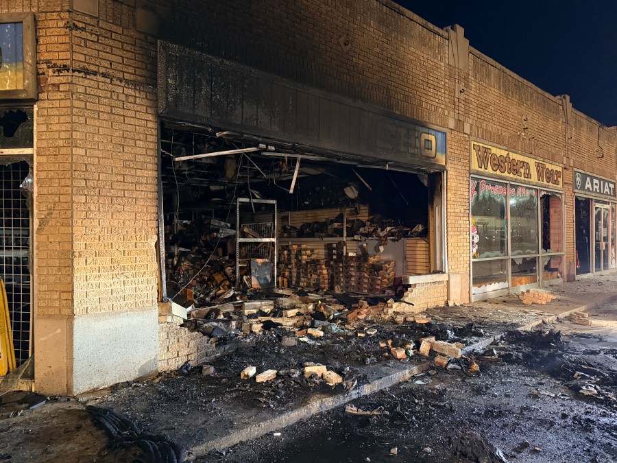 2 killed after car crashes into building; catches on fire