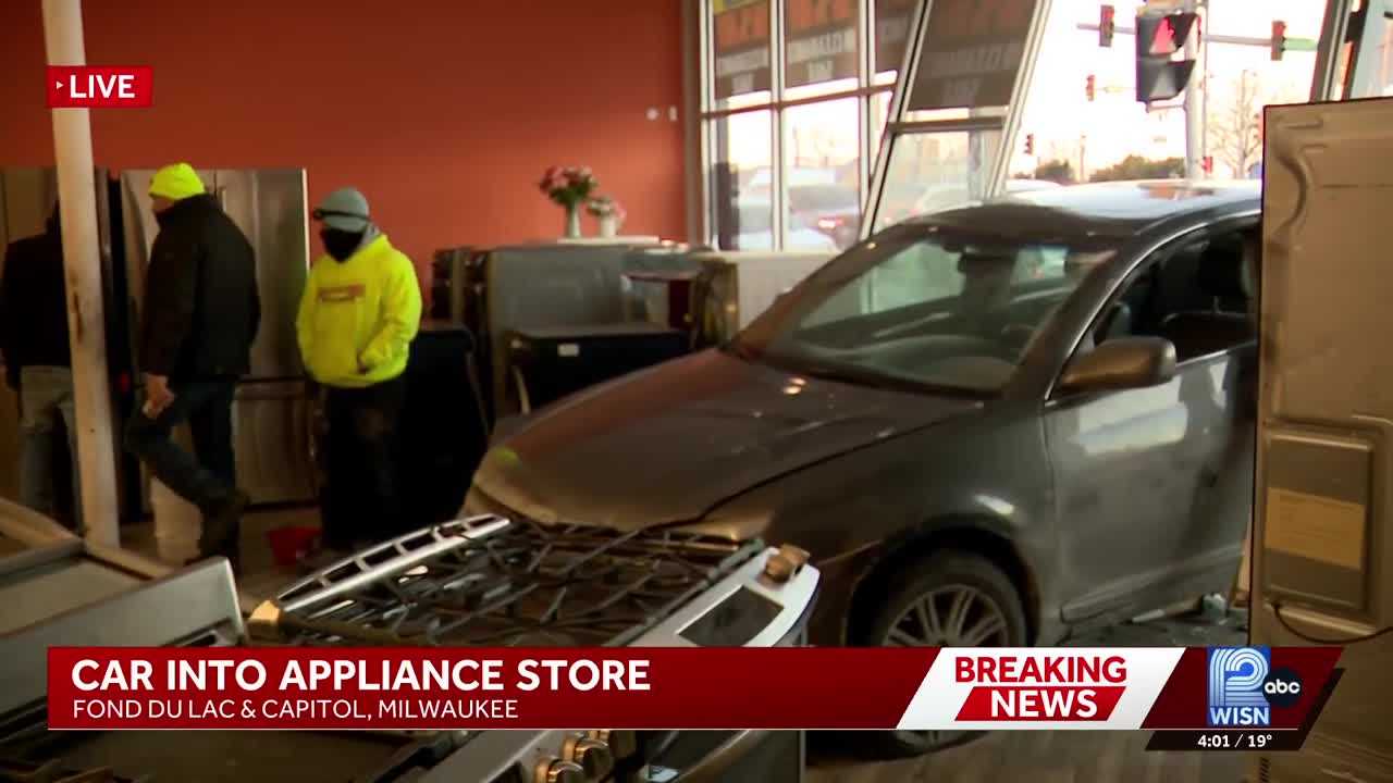 Car plows into appliance store on Milwaukee's northwest side