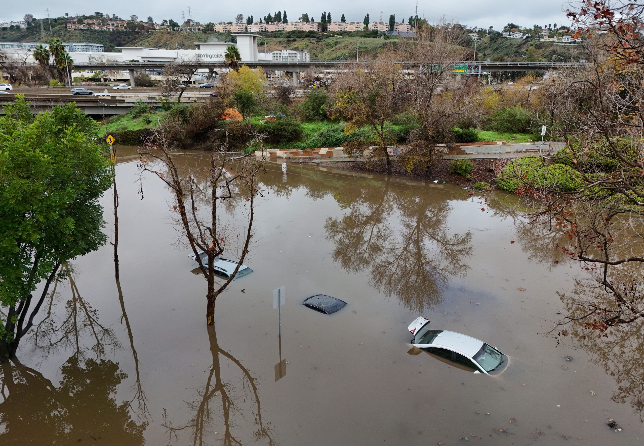 Back-to-back storms slam West Coast, bringing heavy rain, extended ...