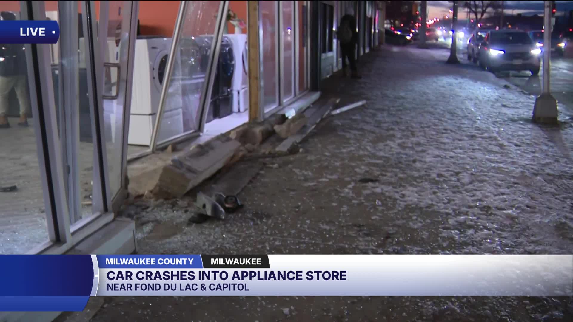 Car crashes into appliance store