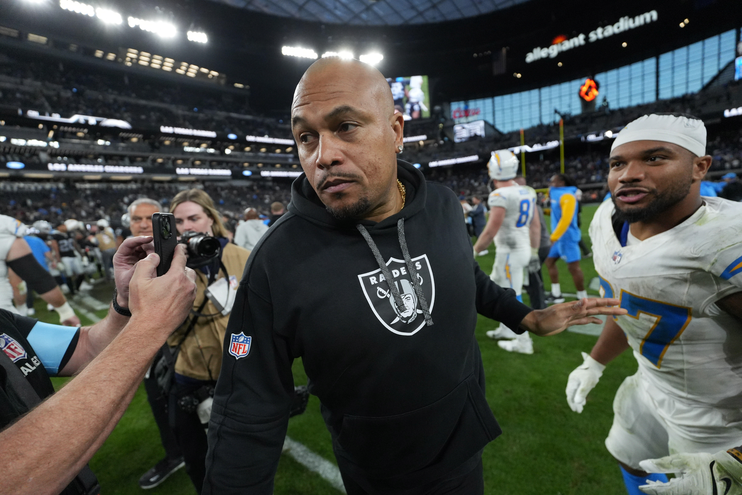 Antonio Pierce emerges as a candidate for one NFL head-coaching job