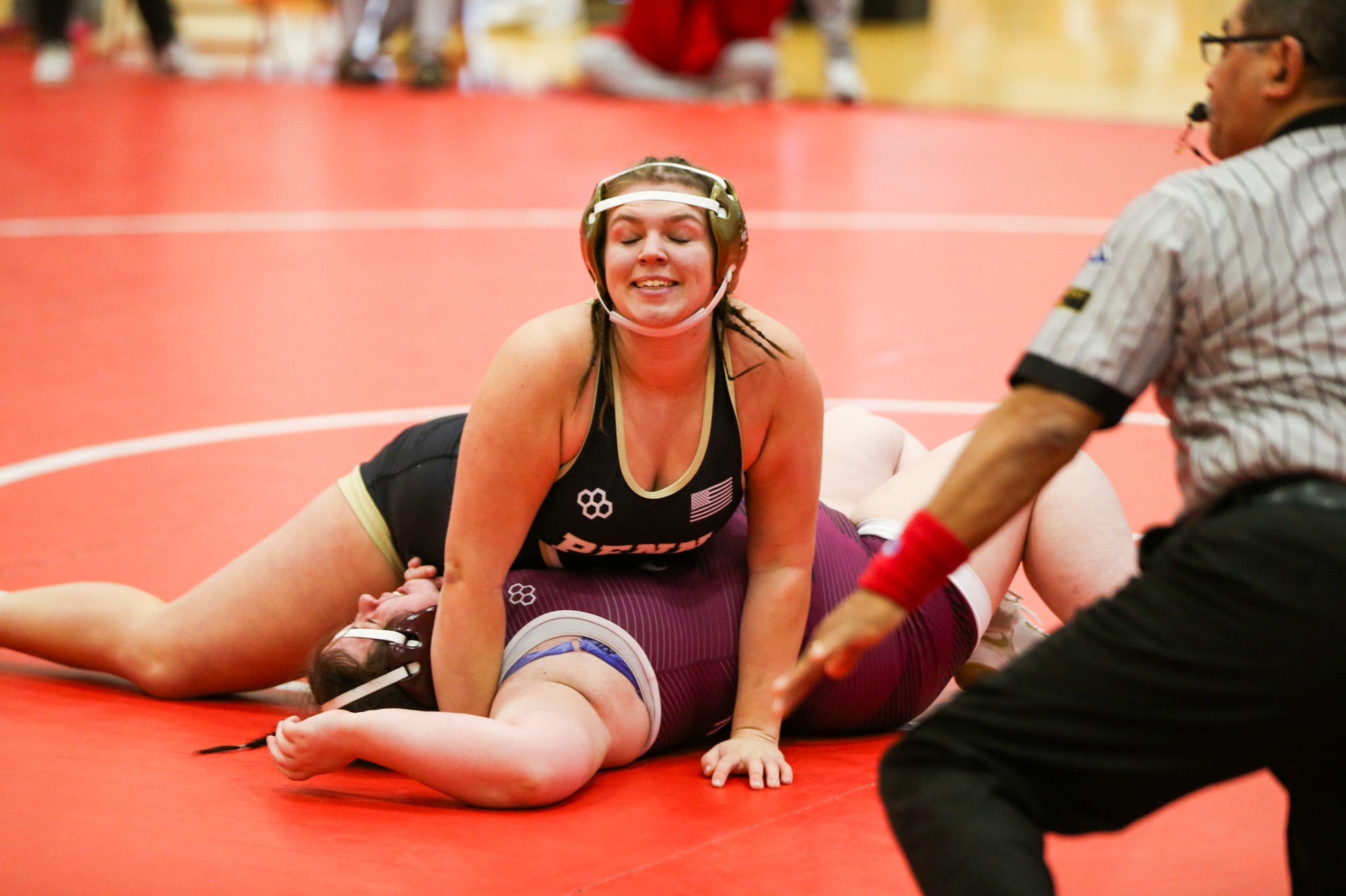 Penn wins IHSAA girls wrestling sectional; 48 advance to regional
