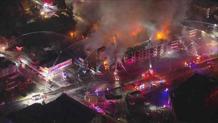 Firefighter injured in Denver five-alarm fire, building engulfed in flames