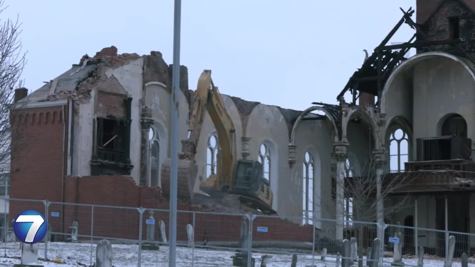 Demolition begins of historic Catholic church destroyed by fire, high winds