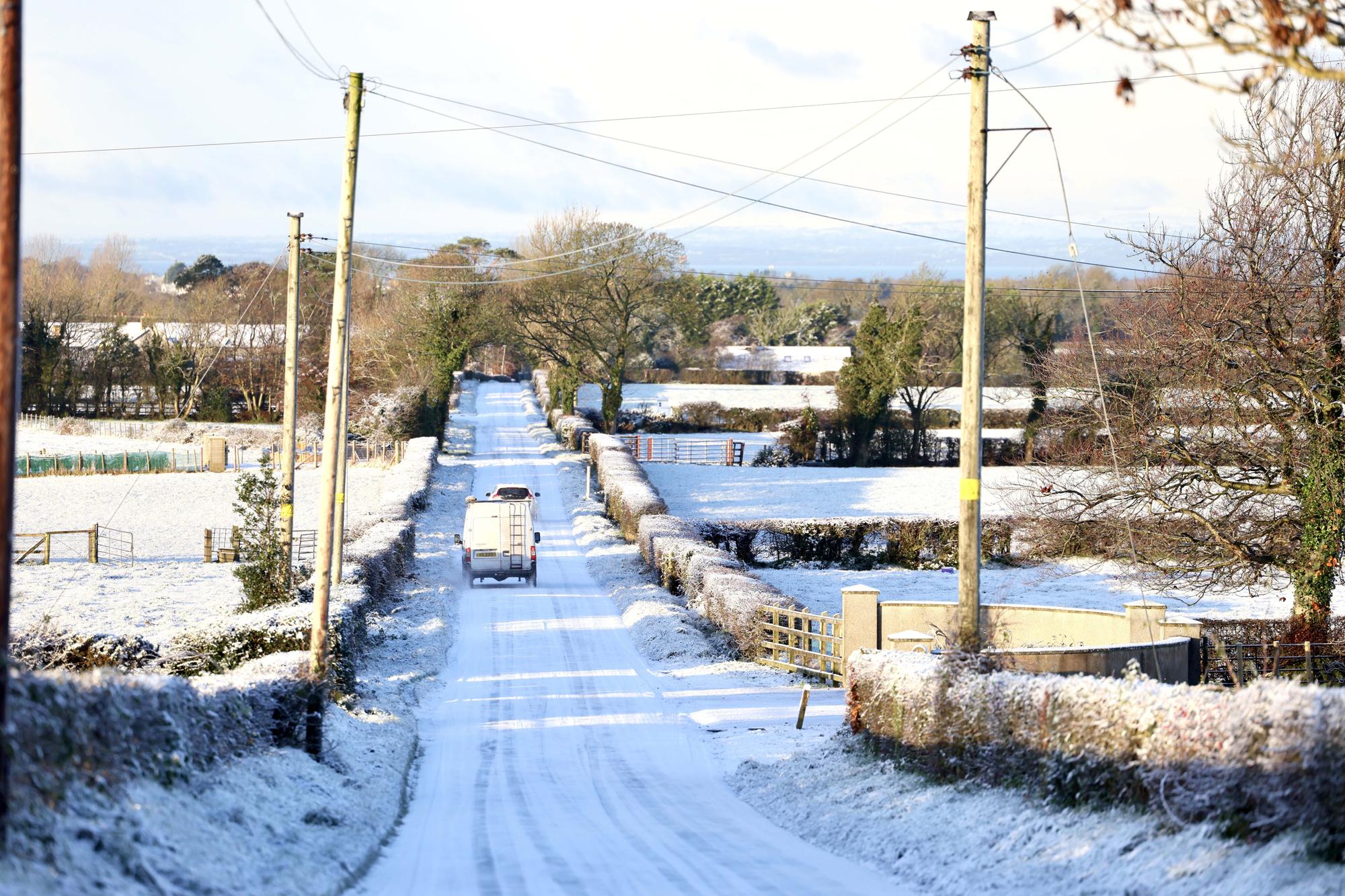 Northern Ireland snow: Police urge drivers to stay at home with icy ...