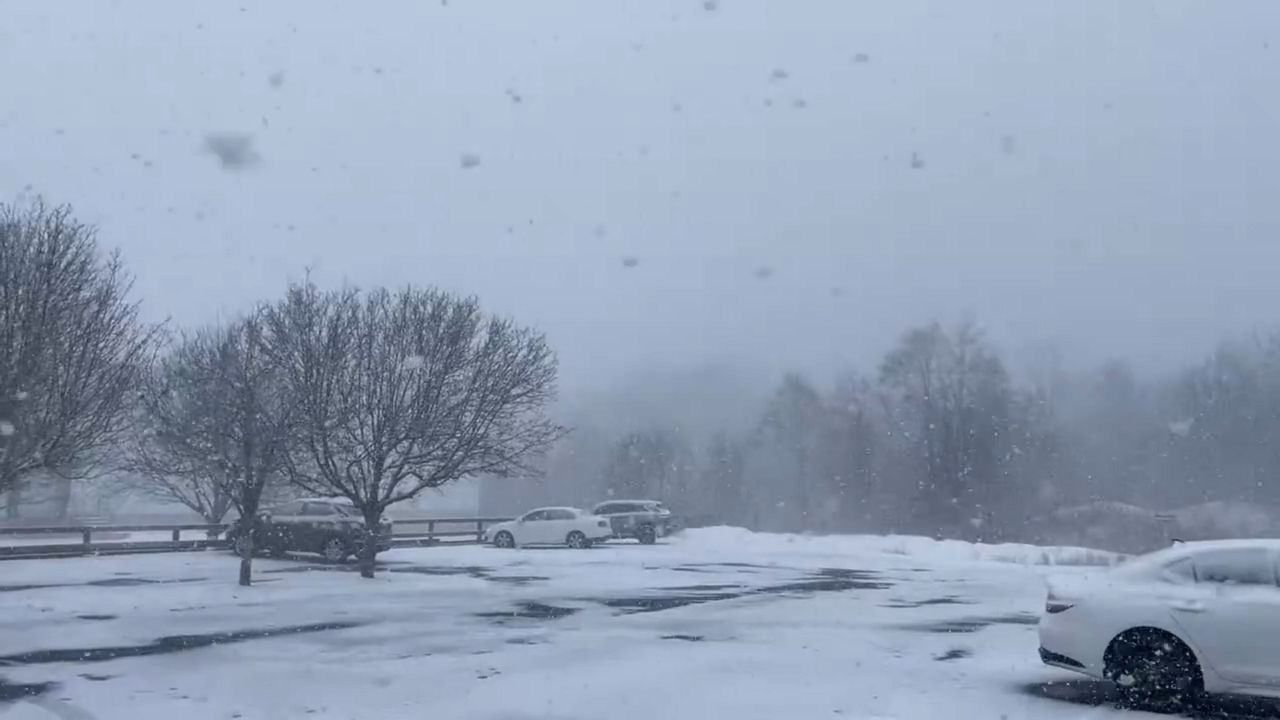 Snow squall reduces visibility on Route 106 in Massachusetts, USA