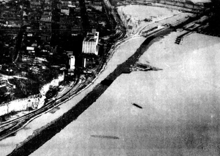 Towboat carves icy channel on the Mississippi River at Alton in 1948