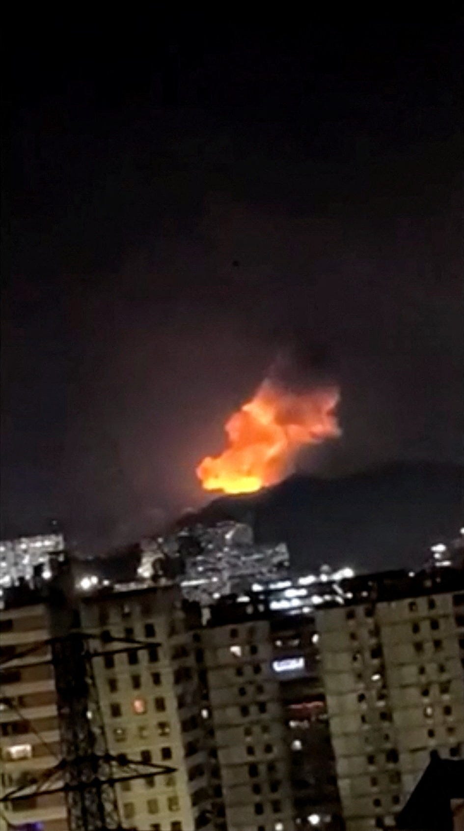 Jets and blasts shake Venezuelan capital, government says US to blame
