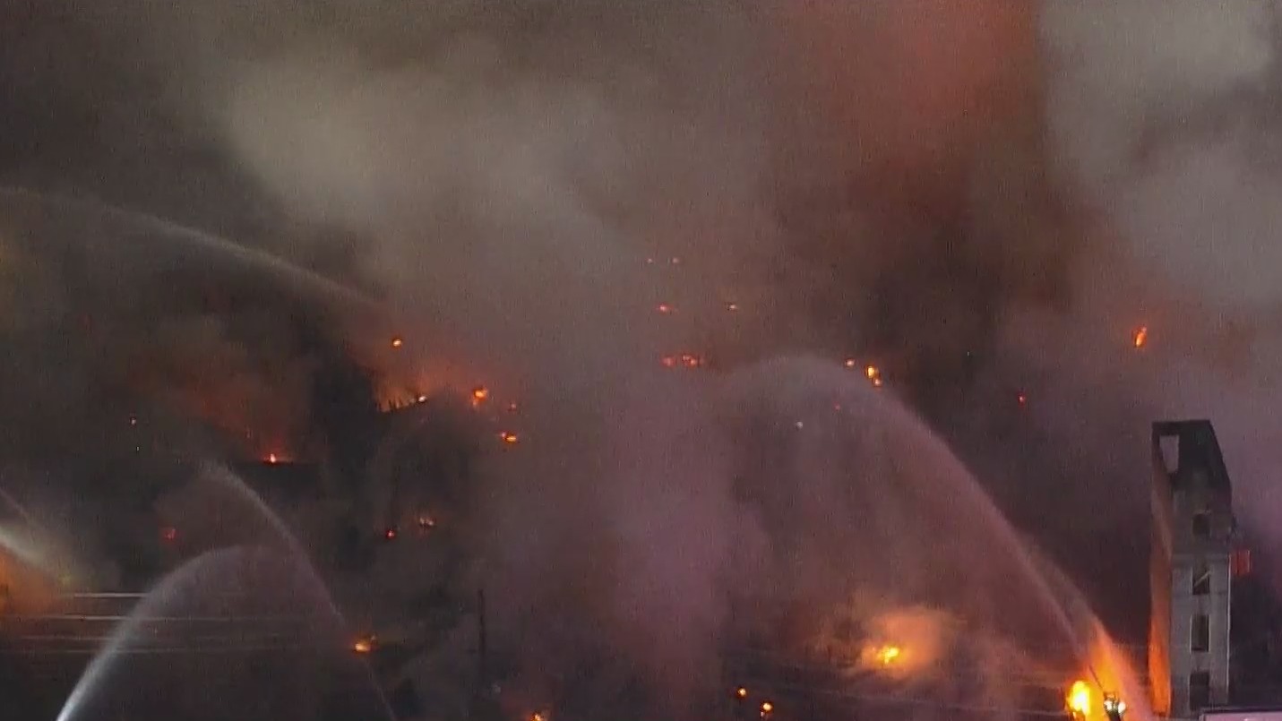 Denver fire crews battle three-alarm fire at building under ...