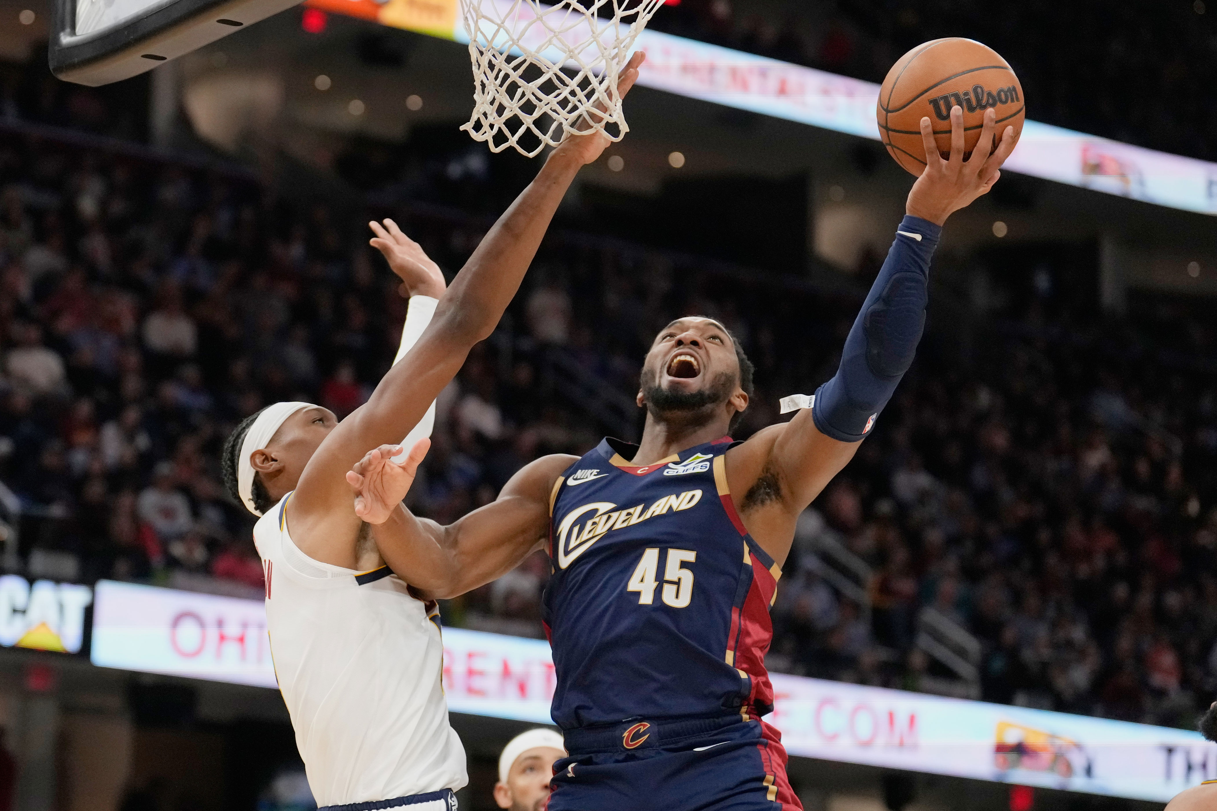 Mitchell's 33 points propel Cavaliers past short-handed Nuggets