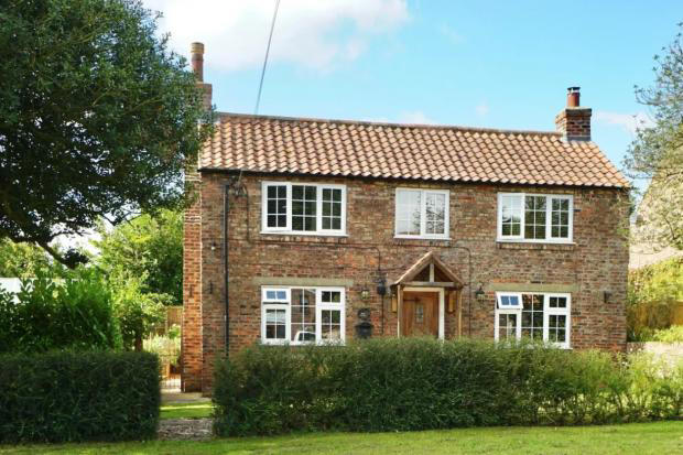 Home 'full of character and charm' for sale in North Yorks village ...