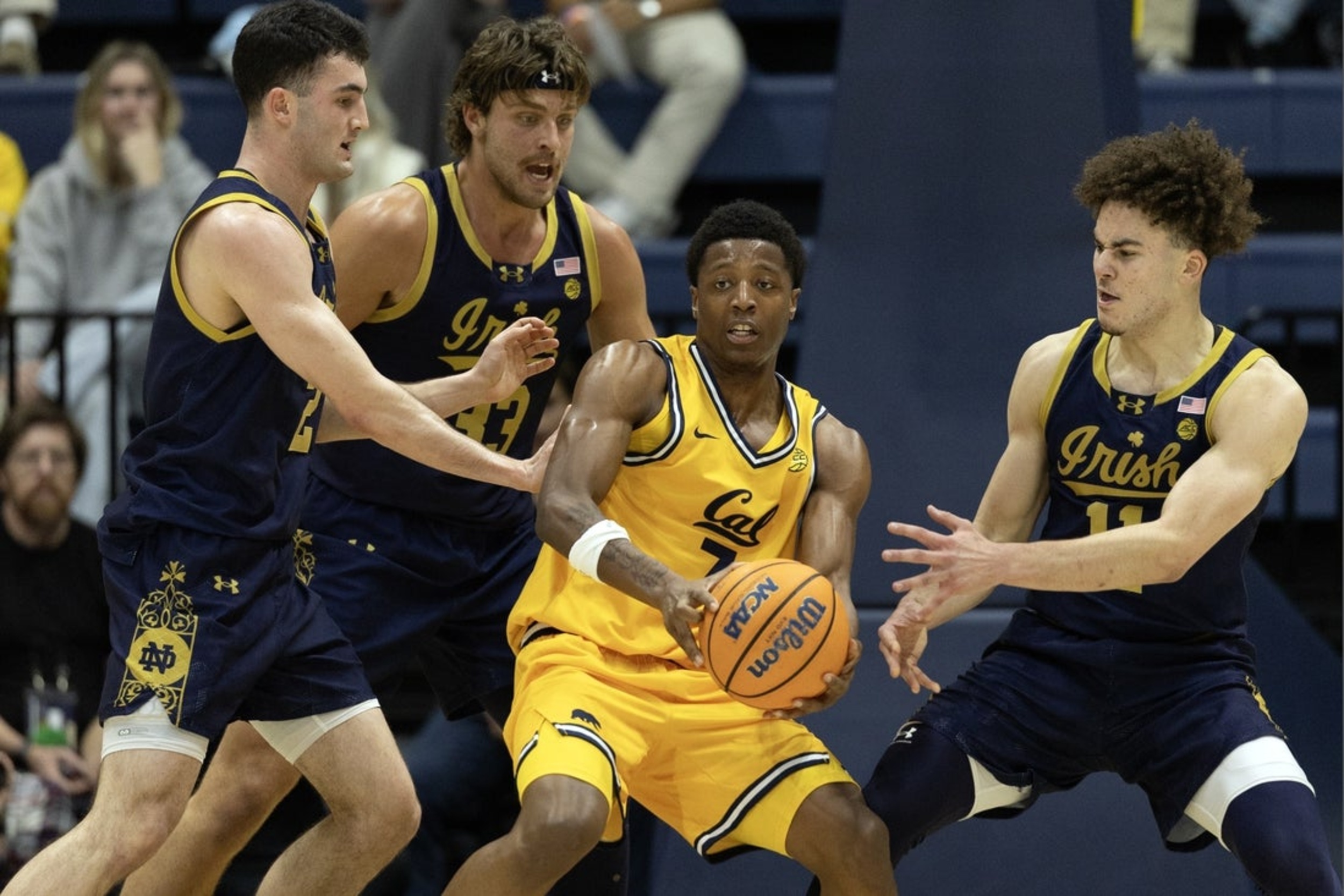 With late call reversal, Cal edges Notre Dame on four-point play