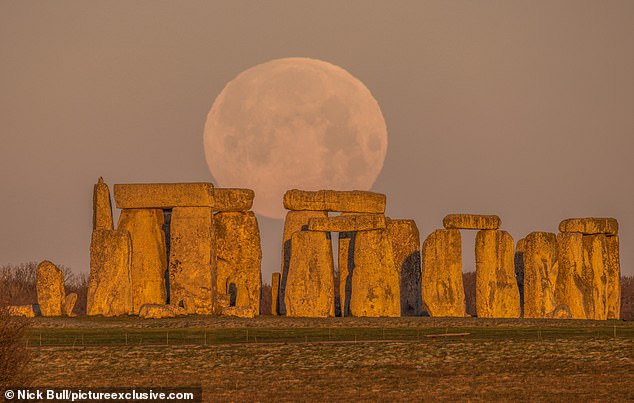 Sky-watchers post spectacular pictures of the first wolf moon of 2026