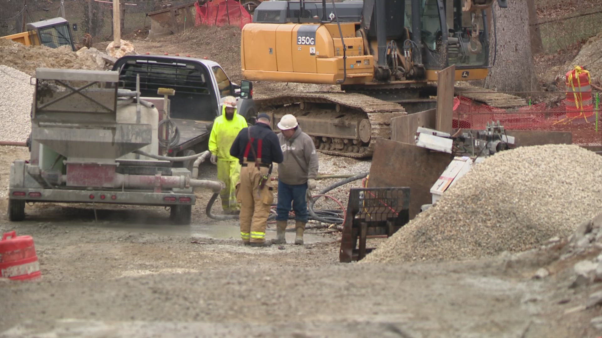 Firefighters rescue worker from trench filled with wet concrete in St ...