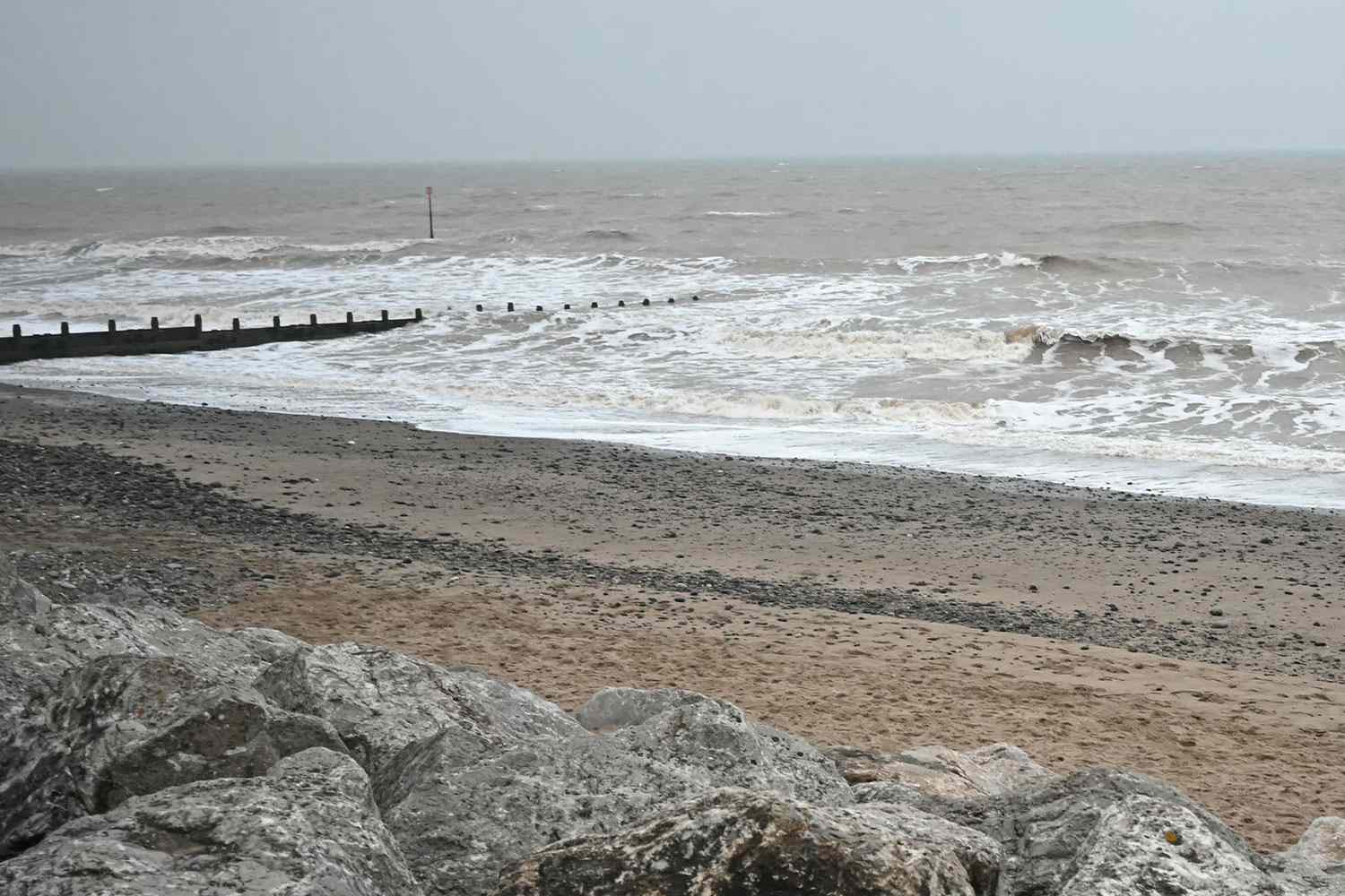 Second body pulled from water, search for third person called off in ...