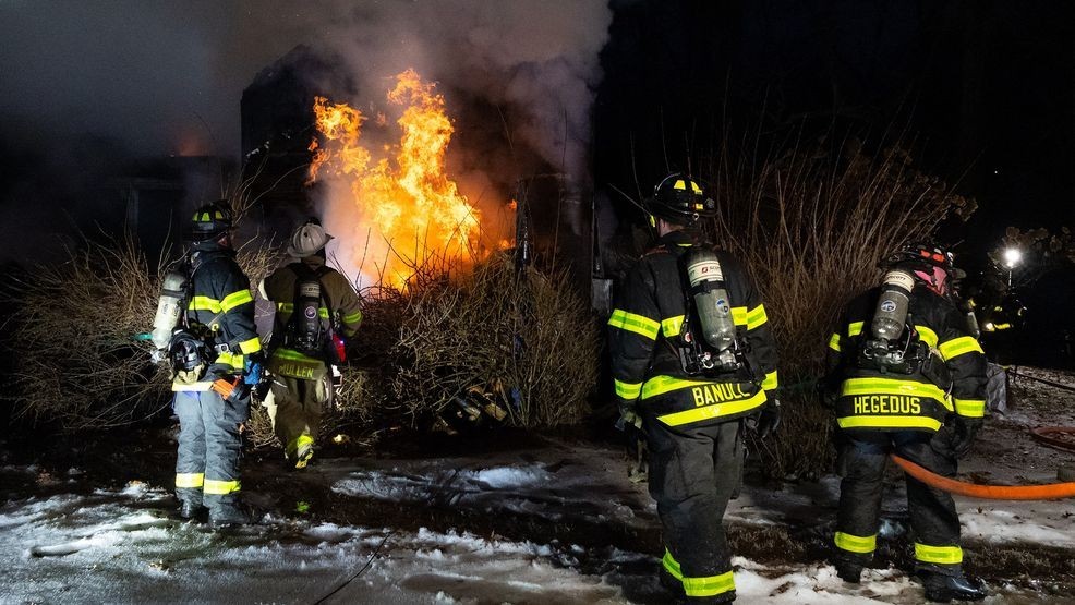 Fire crews battle fully involved house fire in Moosic