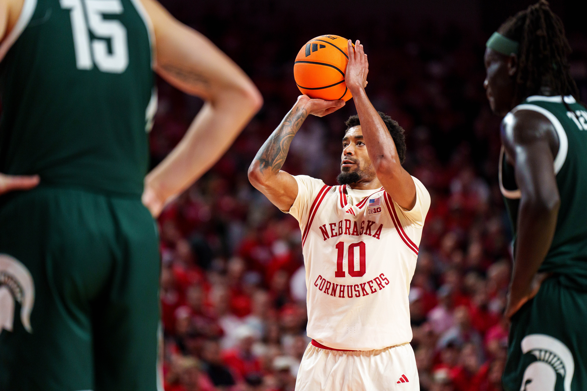 Nebraska pleads with fans: Stop storming the court