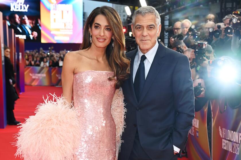 French government defends granting citizenship to George and Amal Clooney