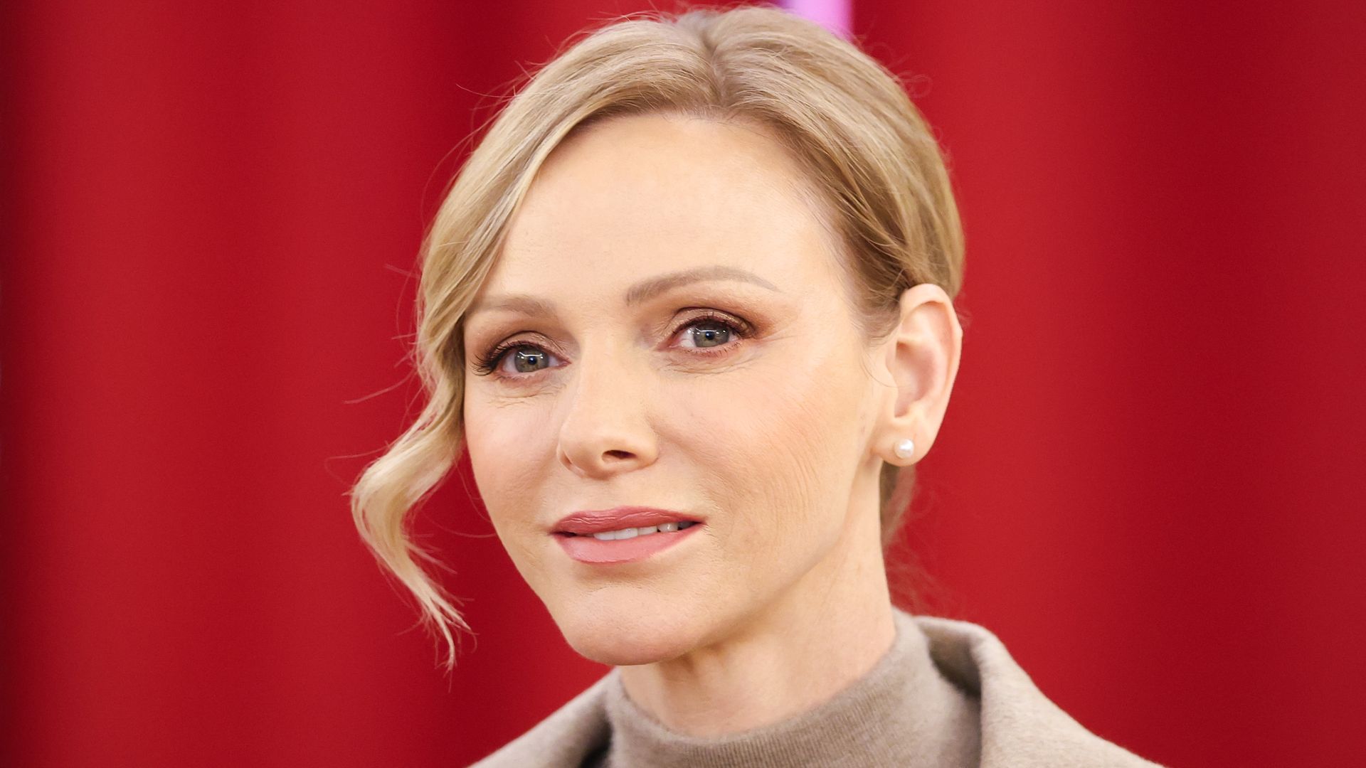 Princess Charlene debuts beachy waves in slinky bridal caped look to ...