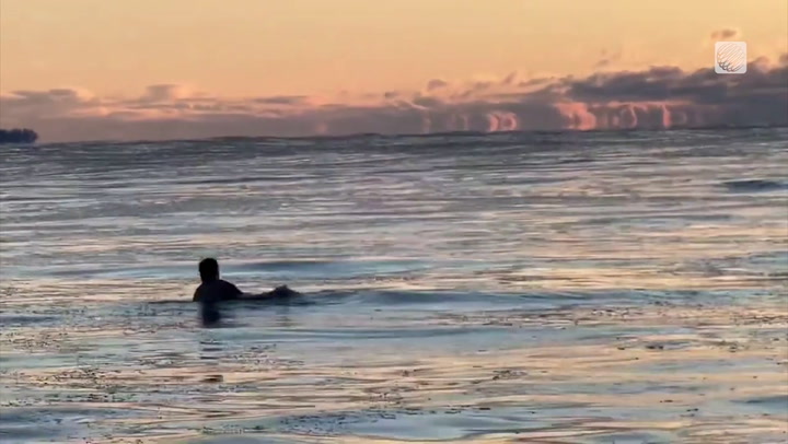 Brave swimmer takes icy New Year's Day plunge in Port Stanley
