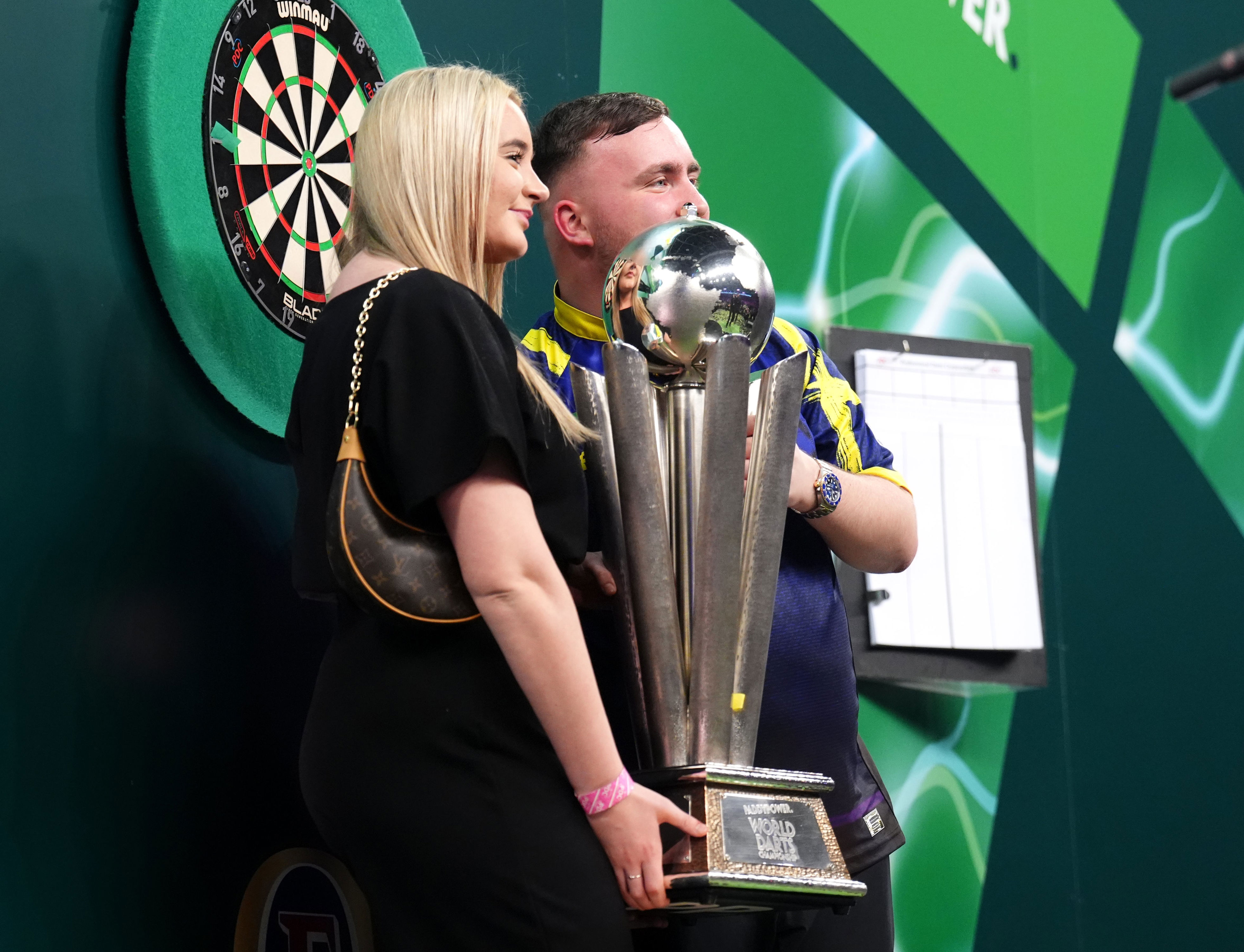 Luke Littler thrashes Gian van Veen to clinch back-to-back world titles