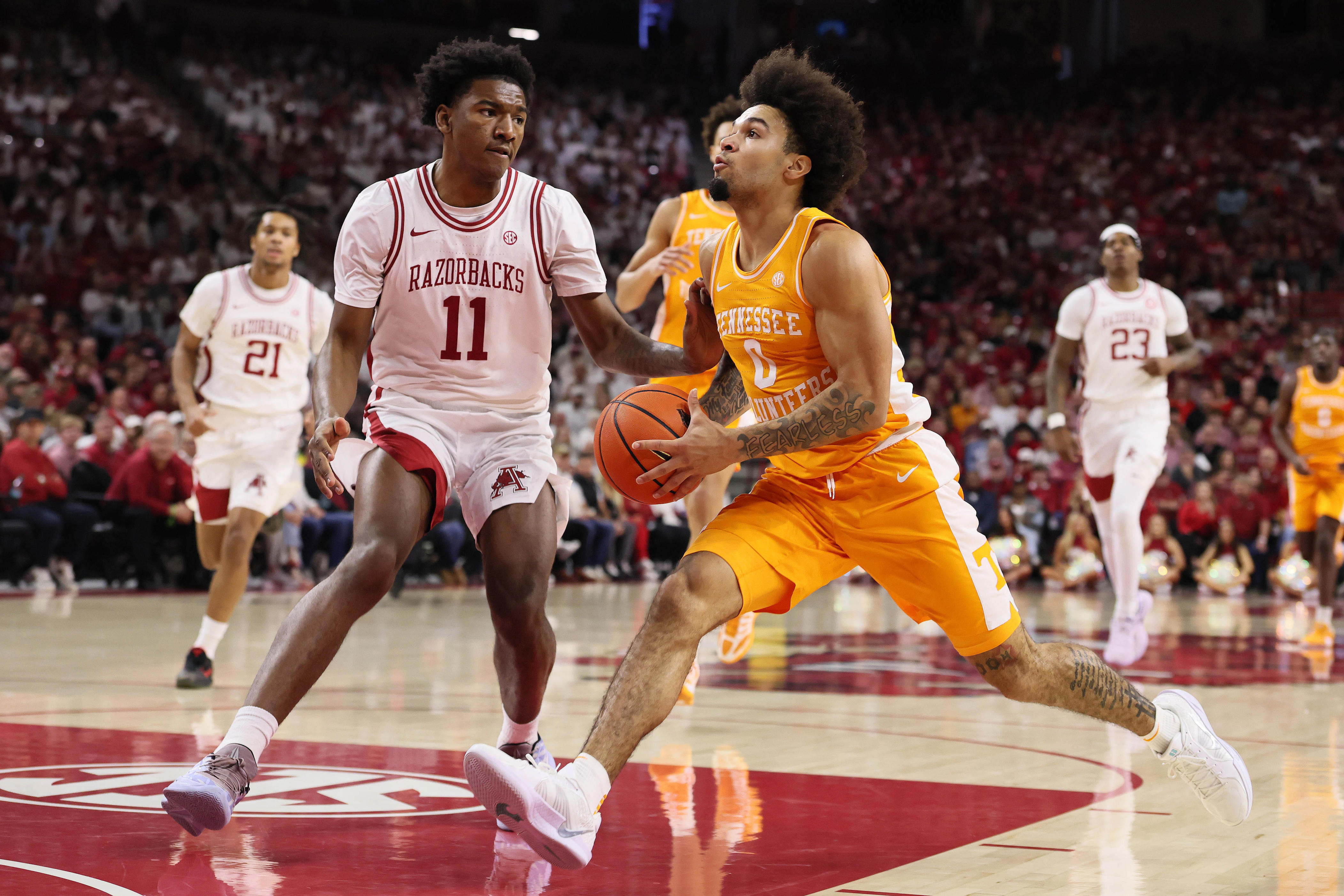 Vols down two spots after losing SEC basketball opener at Arkansas