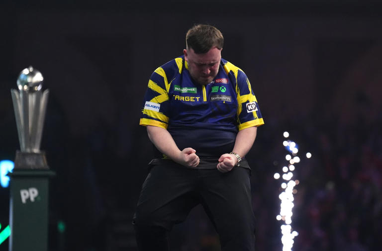 Littler routs Van Veen to win back-to-back World Darts Championships