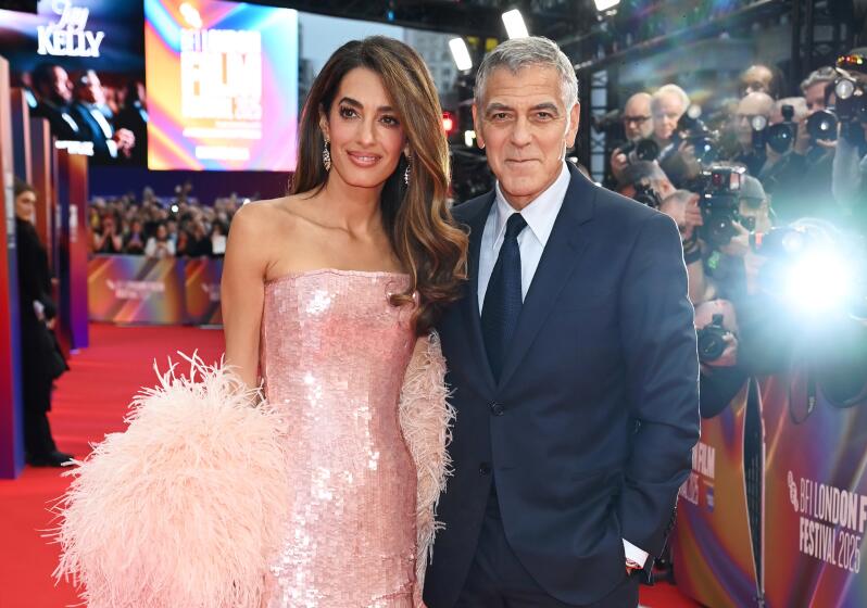 French government defends granting citizenship to George and Amal Clooney