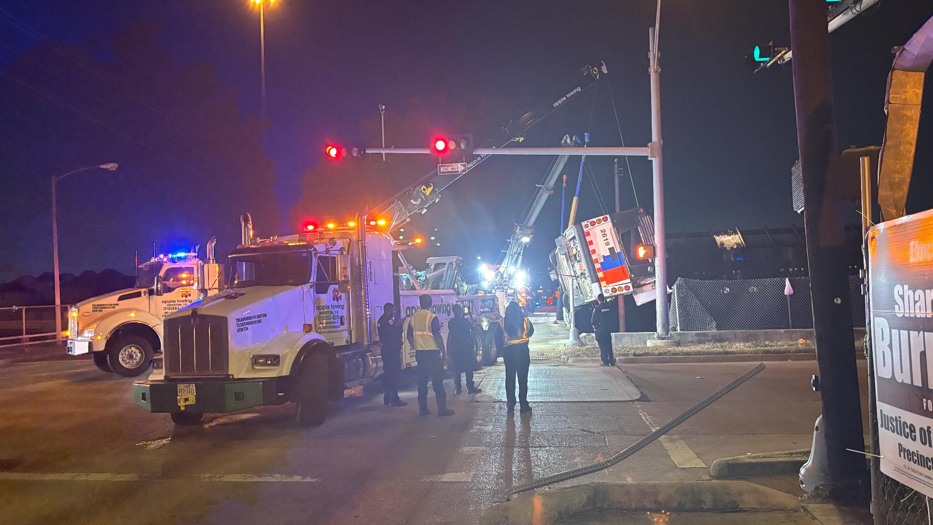 Metro bus that crashed, overturned on Highway 288 lifted back onto street