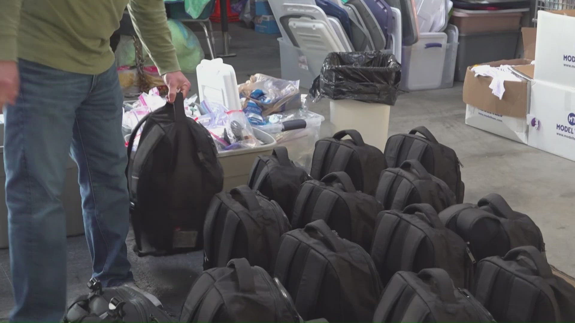 Huntsville volunteers unite to fill 100 backpacks for homeless community