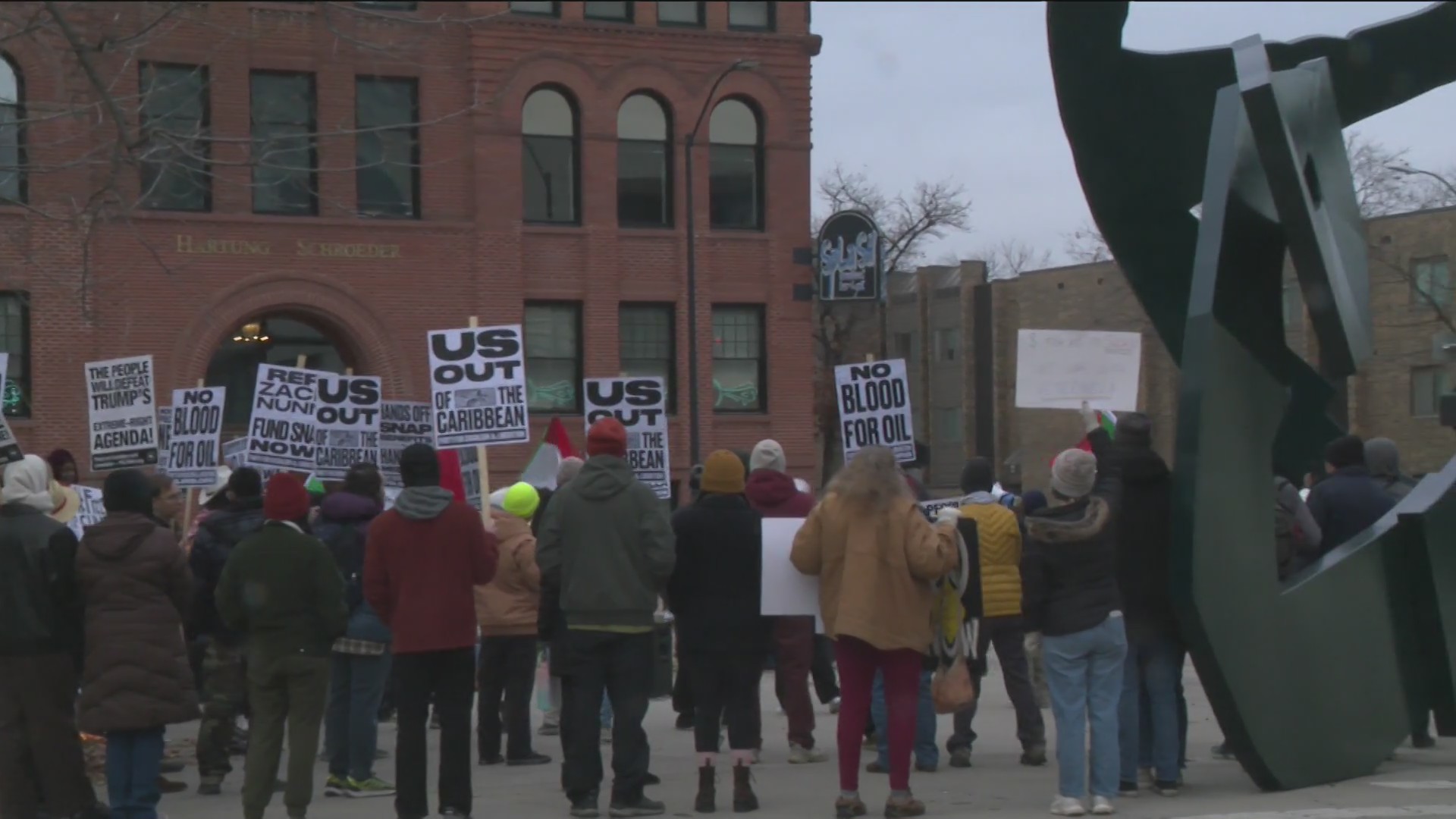 Protestors gather in downtown Des Moines following Venezuela operations