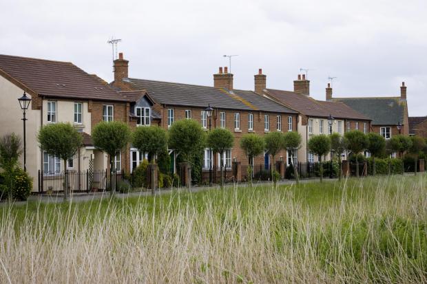 Model urban village celebrates 20 years of successful community living