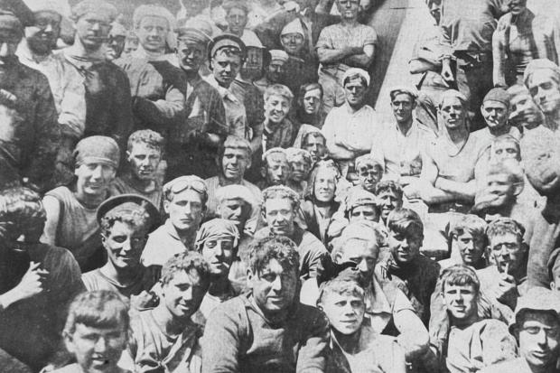 Snap of crew members aboard battleship with a unique weapon