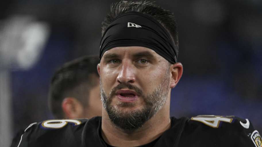 Ravens sign long snapper to extension
